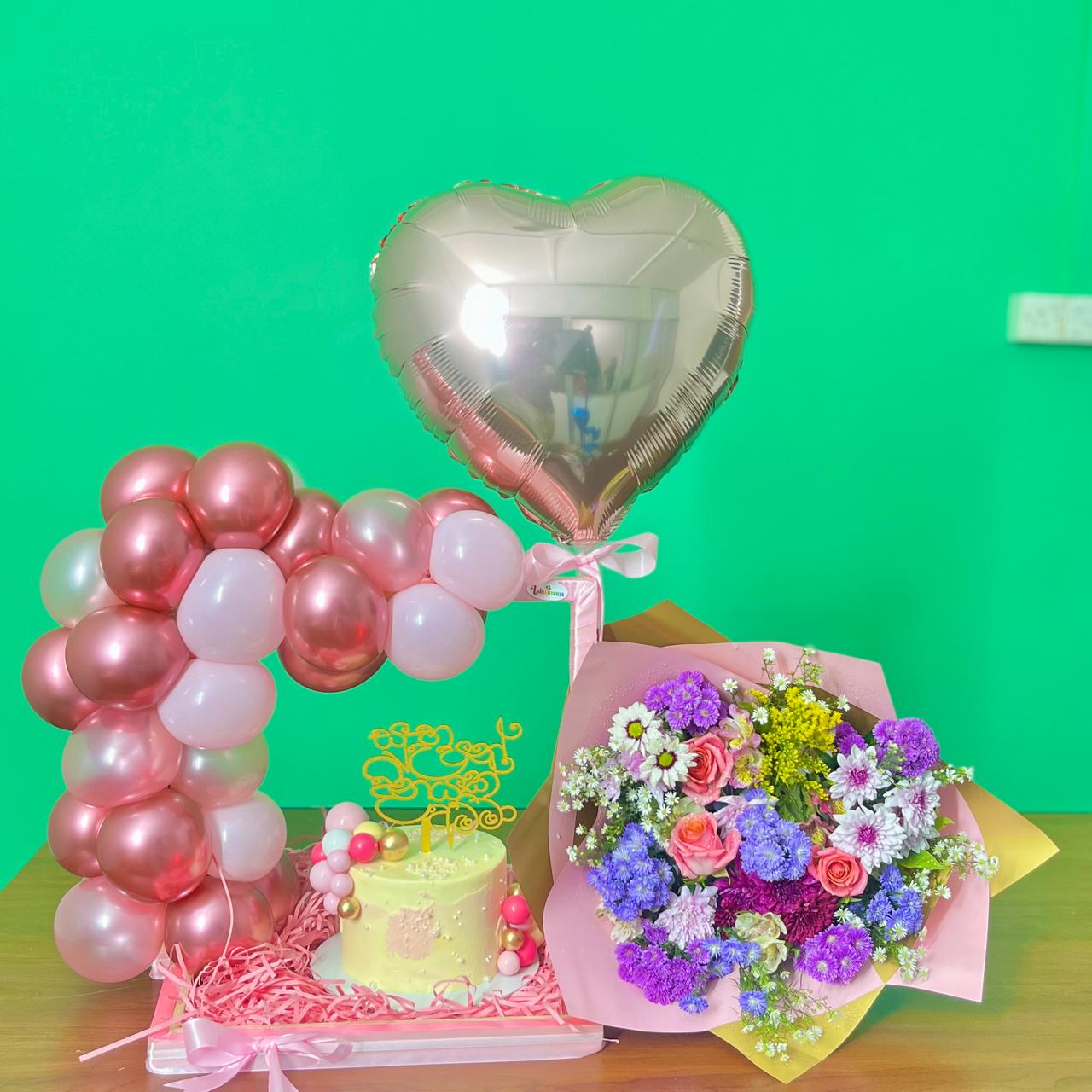 Delight Surprise Balloon Hamper with Cake, Flowers & Heart Balloon ...